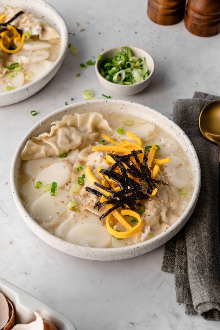 Dduk Mandu Guk (Korean Rice Cake and Dumpling Soup) - Balance With Jess
